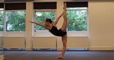 Trim belly fat with dandayamana dhanurasana | TheHealthSite.com