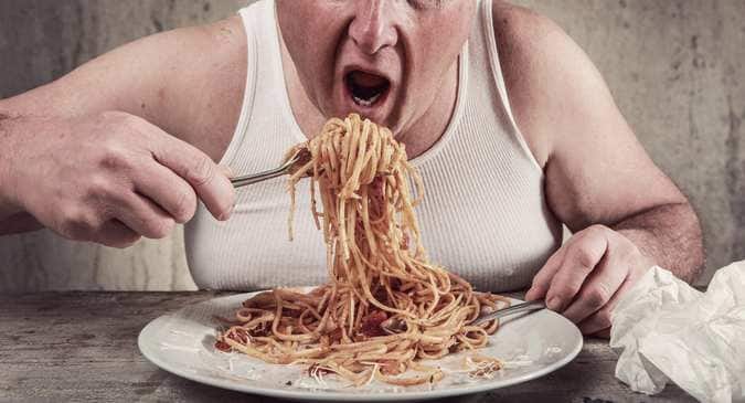 What should you do to ease discomfort when you overeat? | TheHealthSite.com