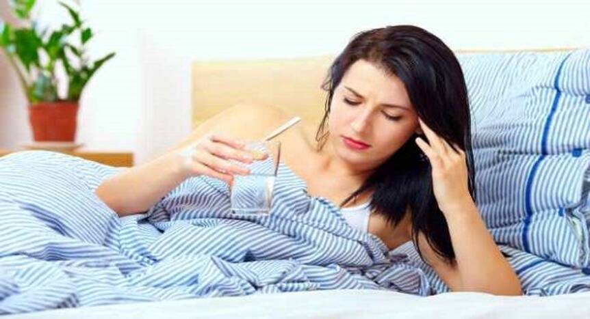 Try these exercises to tackle back pain when bedridden | TheHealthSite.com