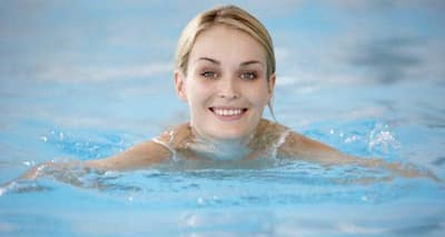 Is swimming ruining your hair and skin? Tips to shield them from ...